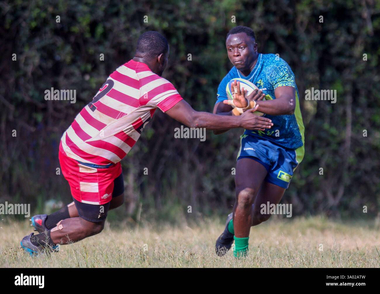 NAIROBI, KENYA - MARCH 1: KCB Isaac Njoroge avoids Impala Joshua Matasi ...