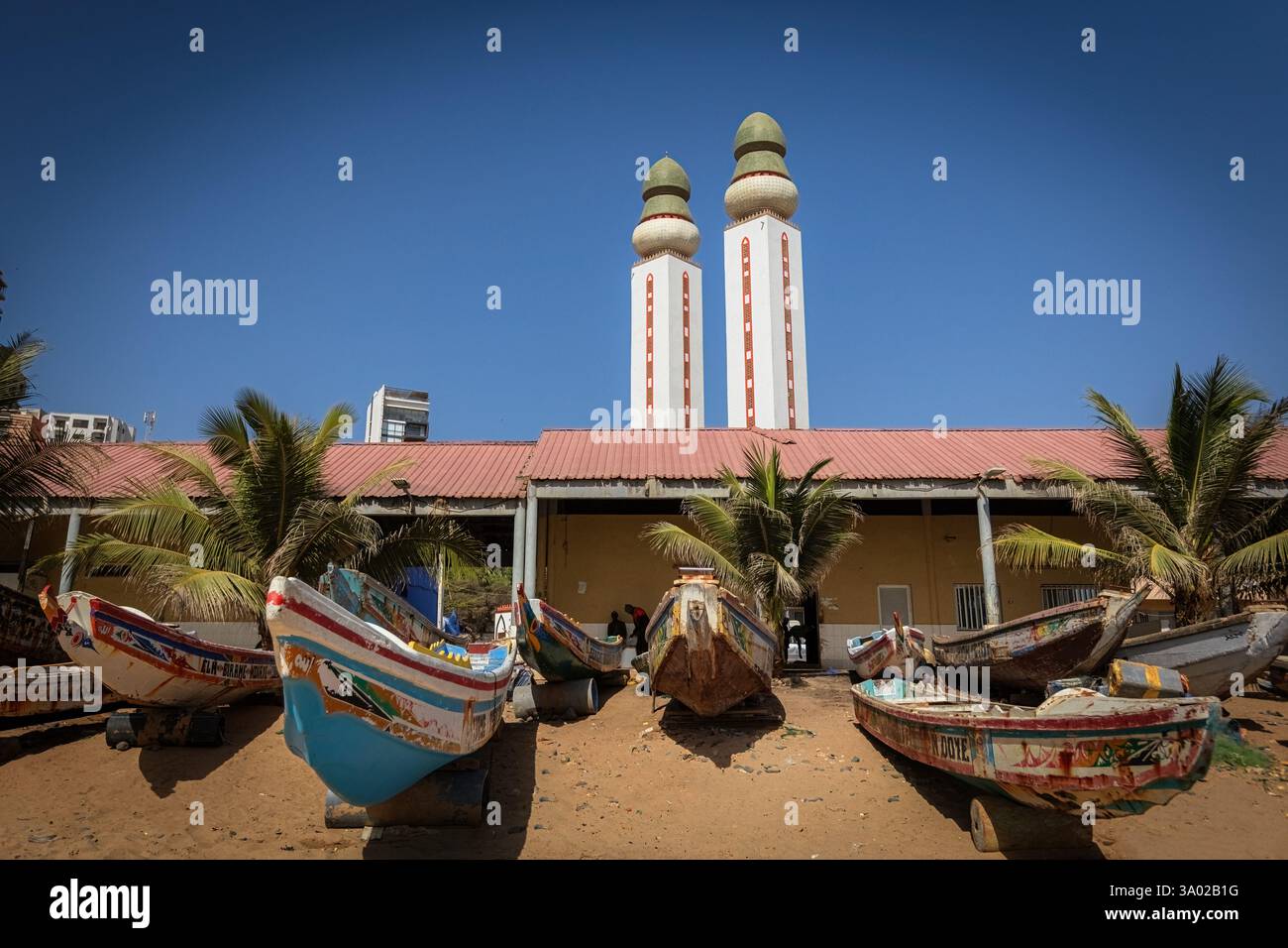Fishing boats on the beach of Dakar Senegal Stock Photo - Alamy