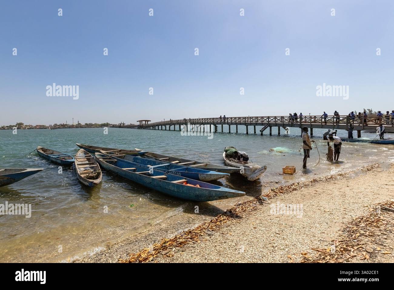 Fishing boats on the beach at Joal Fadiouth the shell island Senegal ...
