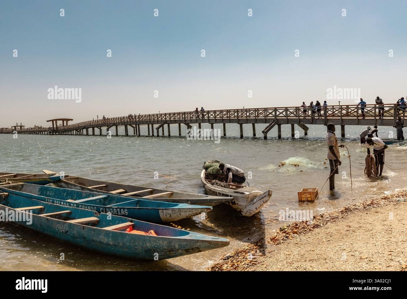 Fishing boats on the beach at Joal Fadiouth the shell island Senegal ...