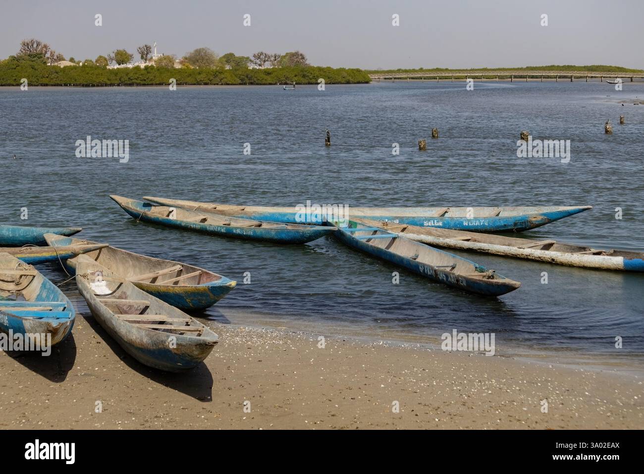 Fishing boats on the beach at Joal Fadiouth the shell island Senegal ...