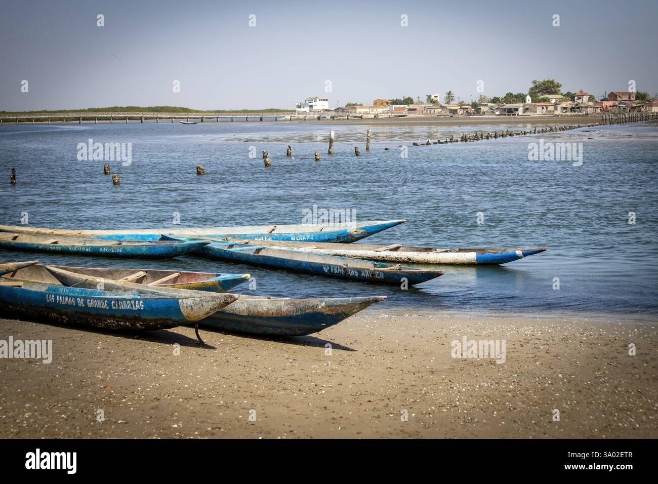 Fishing boats on the beach at Joal Fadiouth the shell island Senegal ...