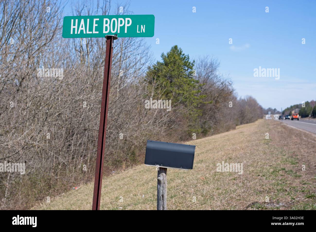 Road sign for Hale Bopp Lane with a mailbox and road frontage Stock ...