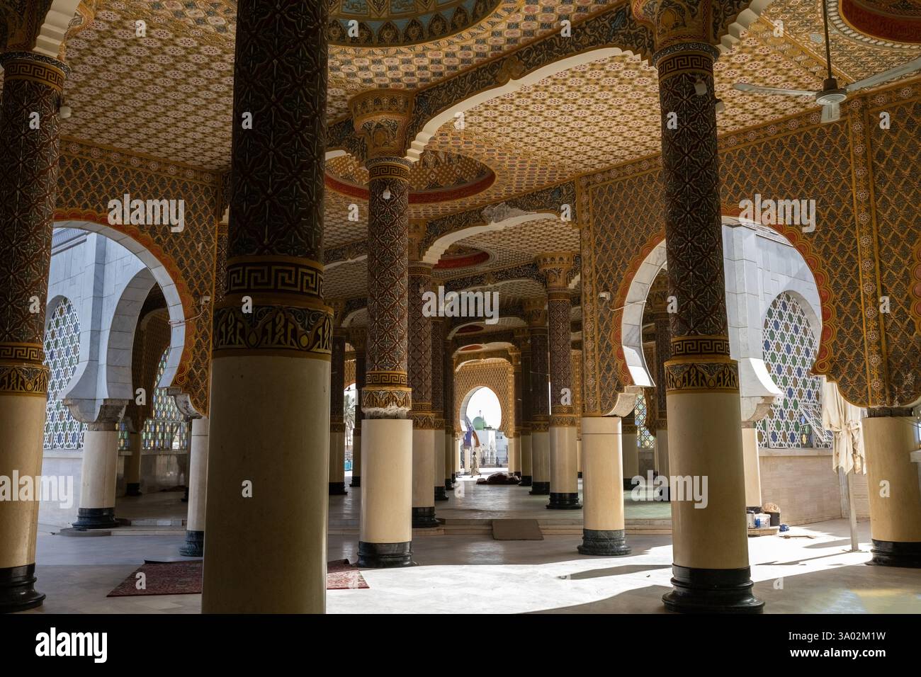 Internal yard with pillars and beautiful mosaic in the Touba Mosque ...