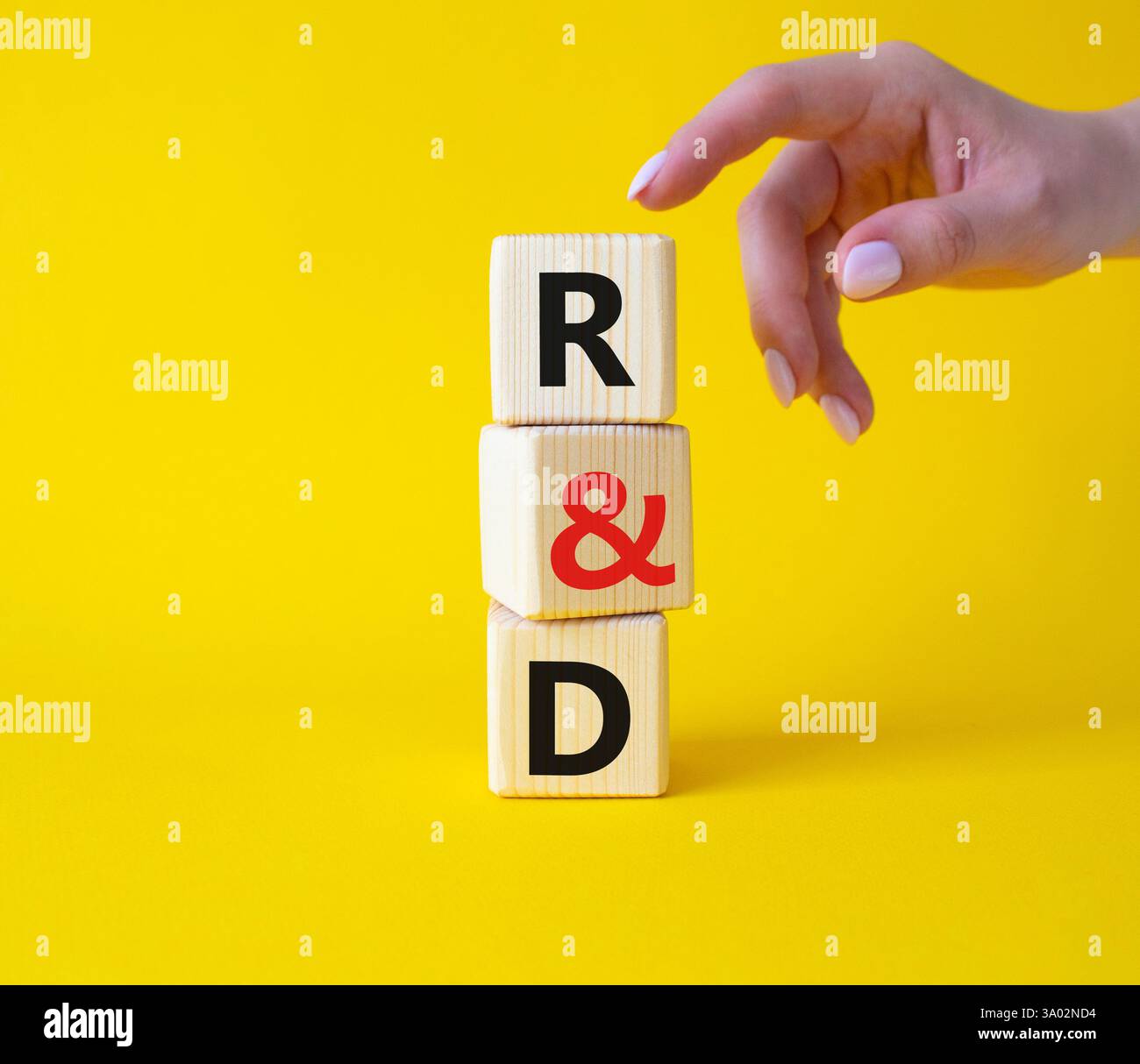 R and D - research and development symbol. Wooden cubes with word R and ...