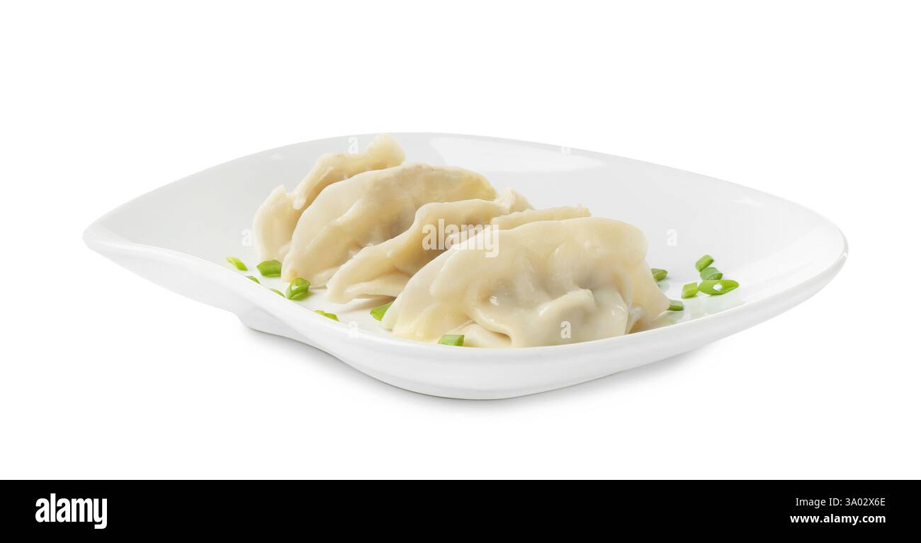 Tasty boiled gyoza (dumplings) with green onion on white background ...