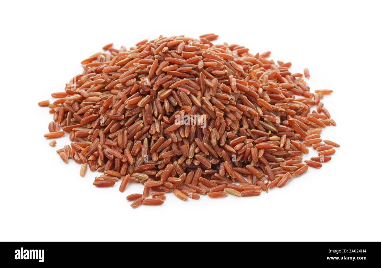Pile of raw brown rice isolated on white Stock Photo - Alamy