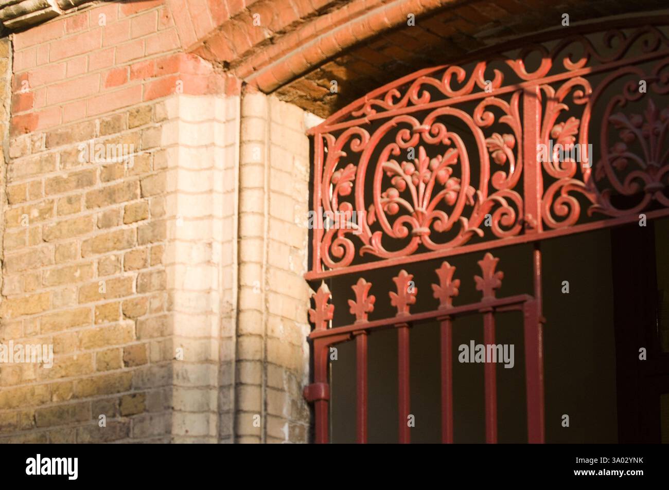Wrought iron gate brick hi-res stock photography and images - Alamy