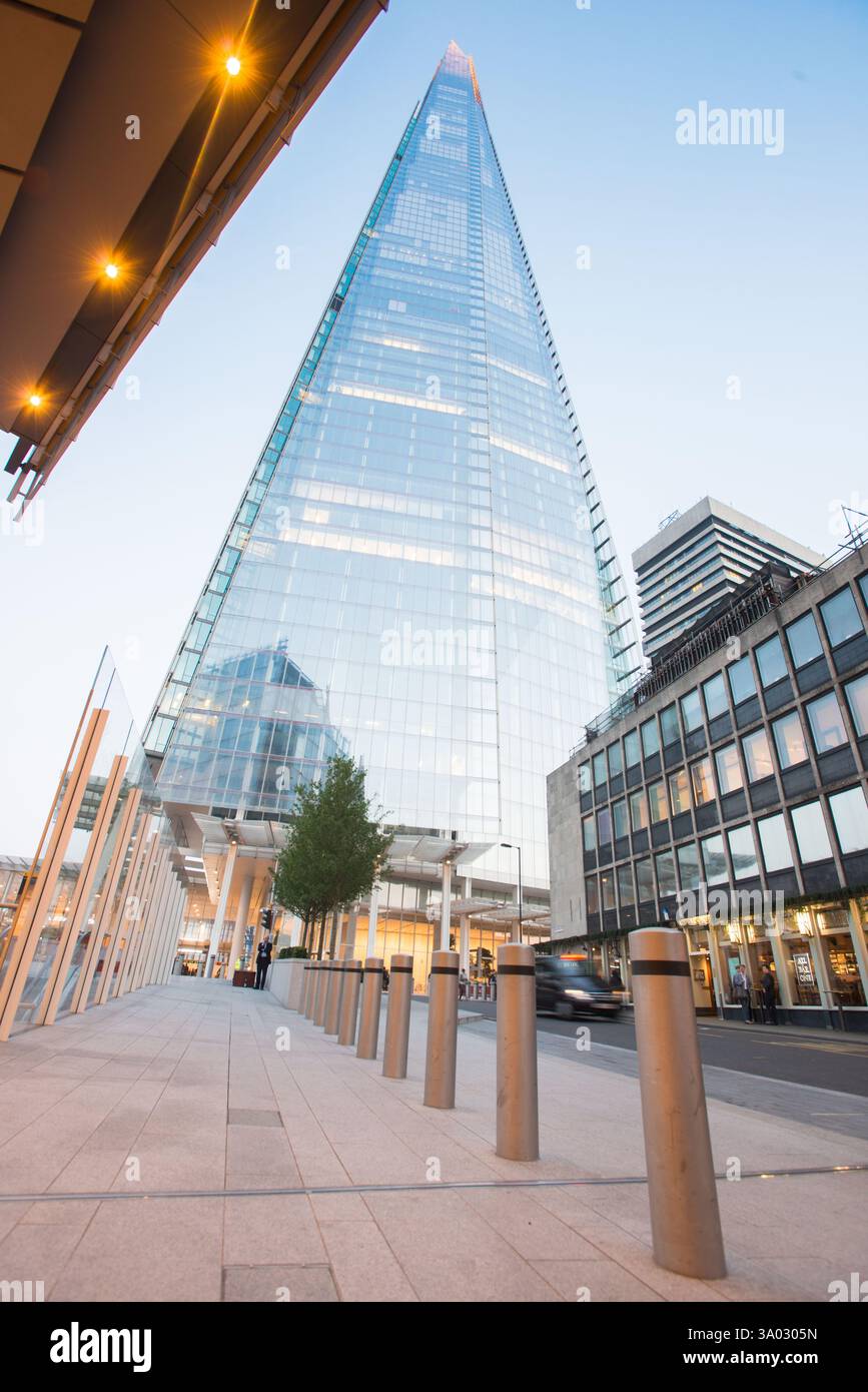 The Shard, London's tallest building, dominates the skyline. Pedestrian ...