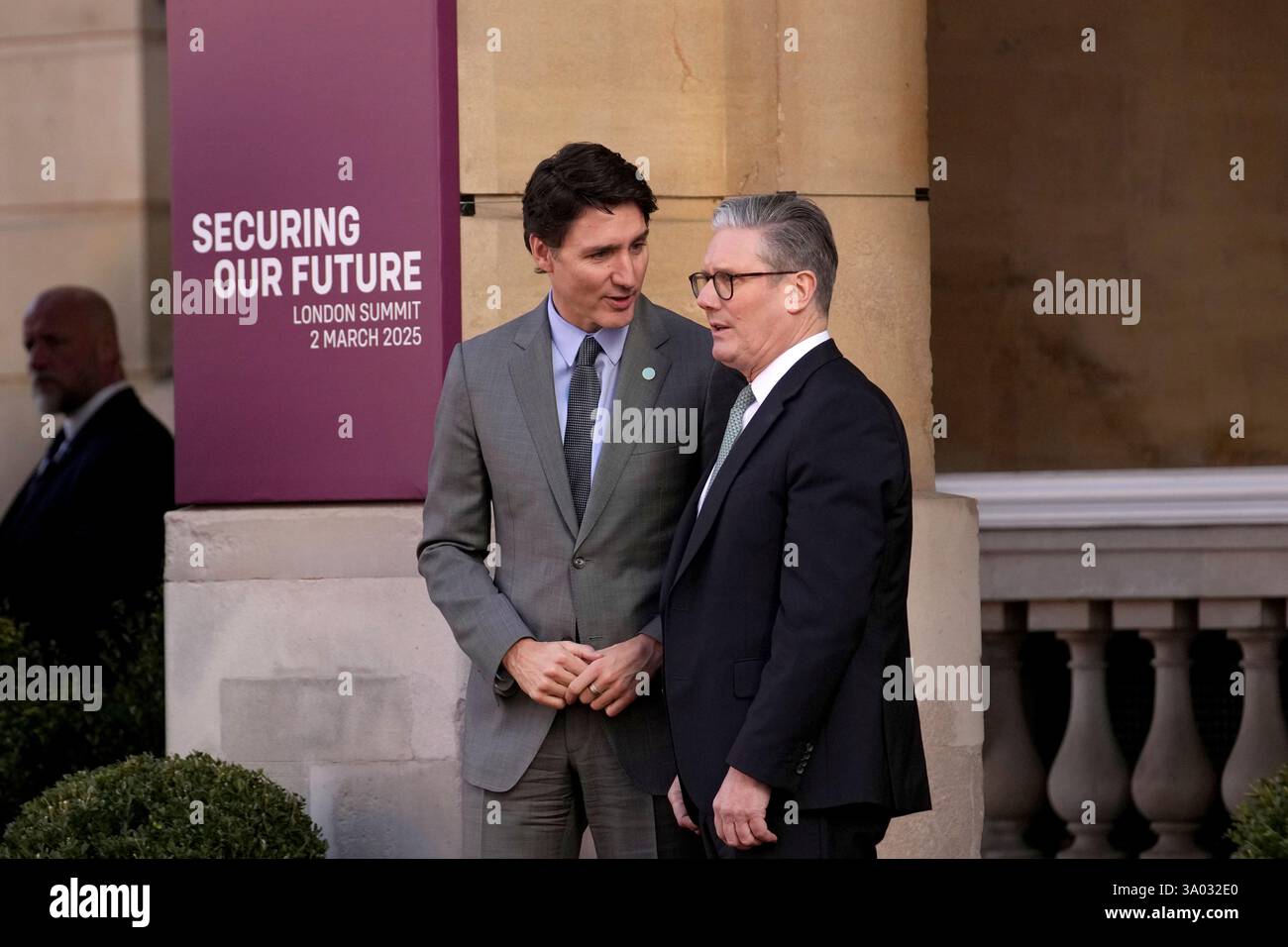 Britain's Prime Minister Keir Starmer, right, greets Canada's Prime ...