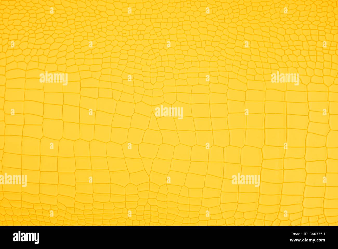 Yellow color crocodile skin artificial leather with waves and folds on ...