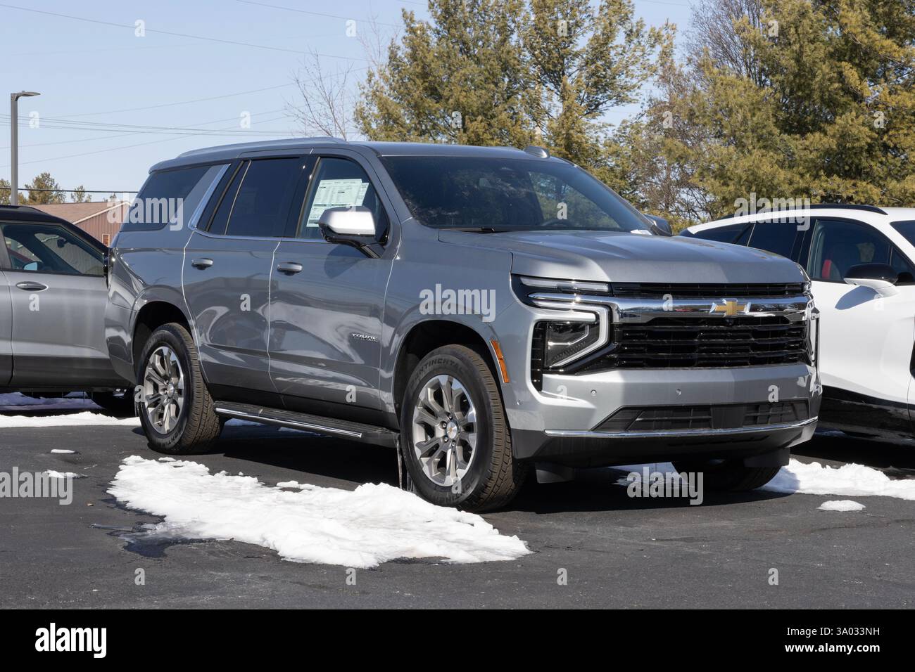 Avon - February 23, 2025: Chevrolet Tahoe 4WD LS display in snow. Chevy ...