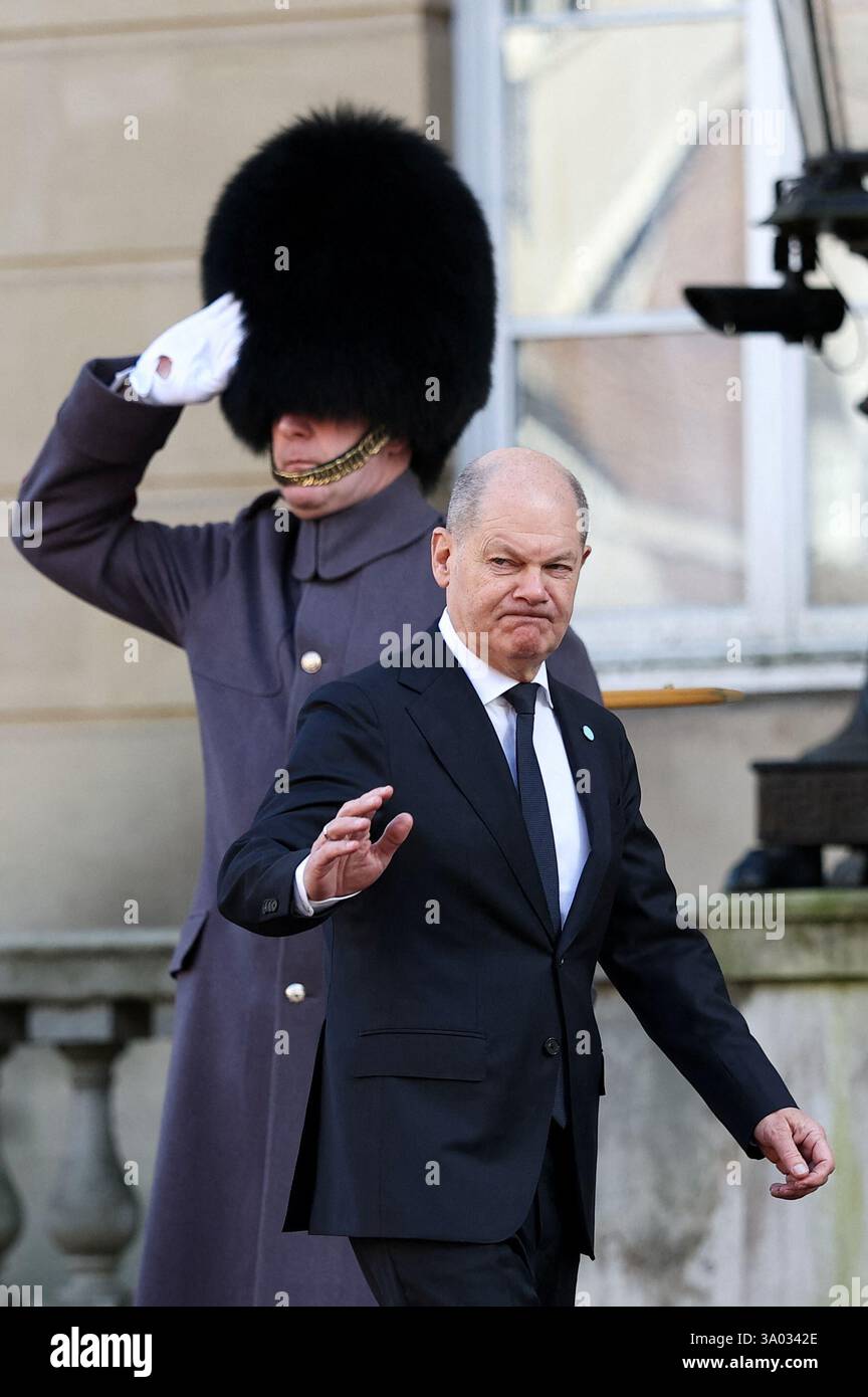 German Chancellor Olaf Scholz walks outside Lancaster House, London, as ...