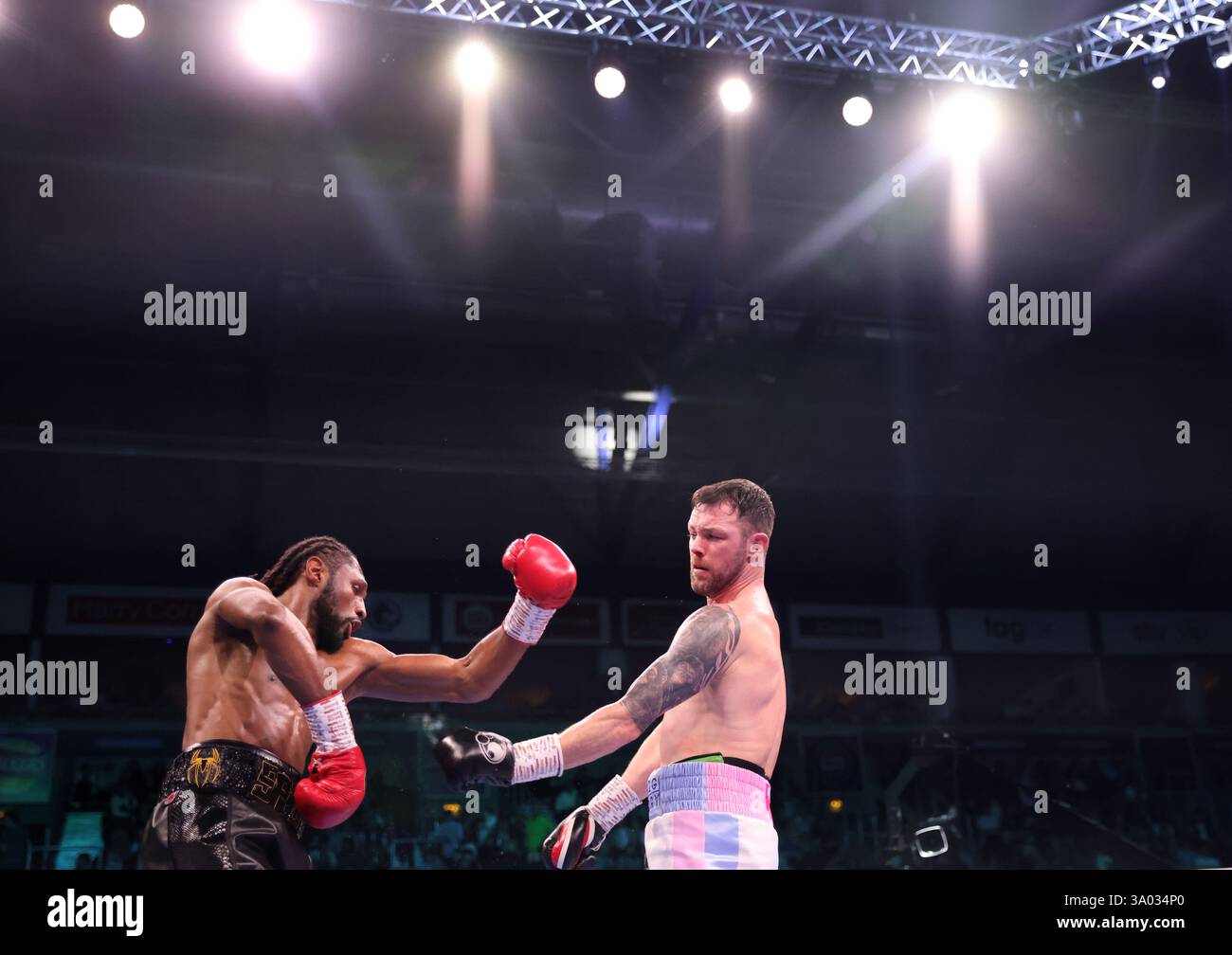 Craig Richards pushes Padraig McCrory during their Light Heavyweight ...