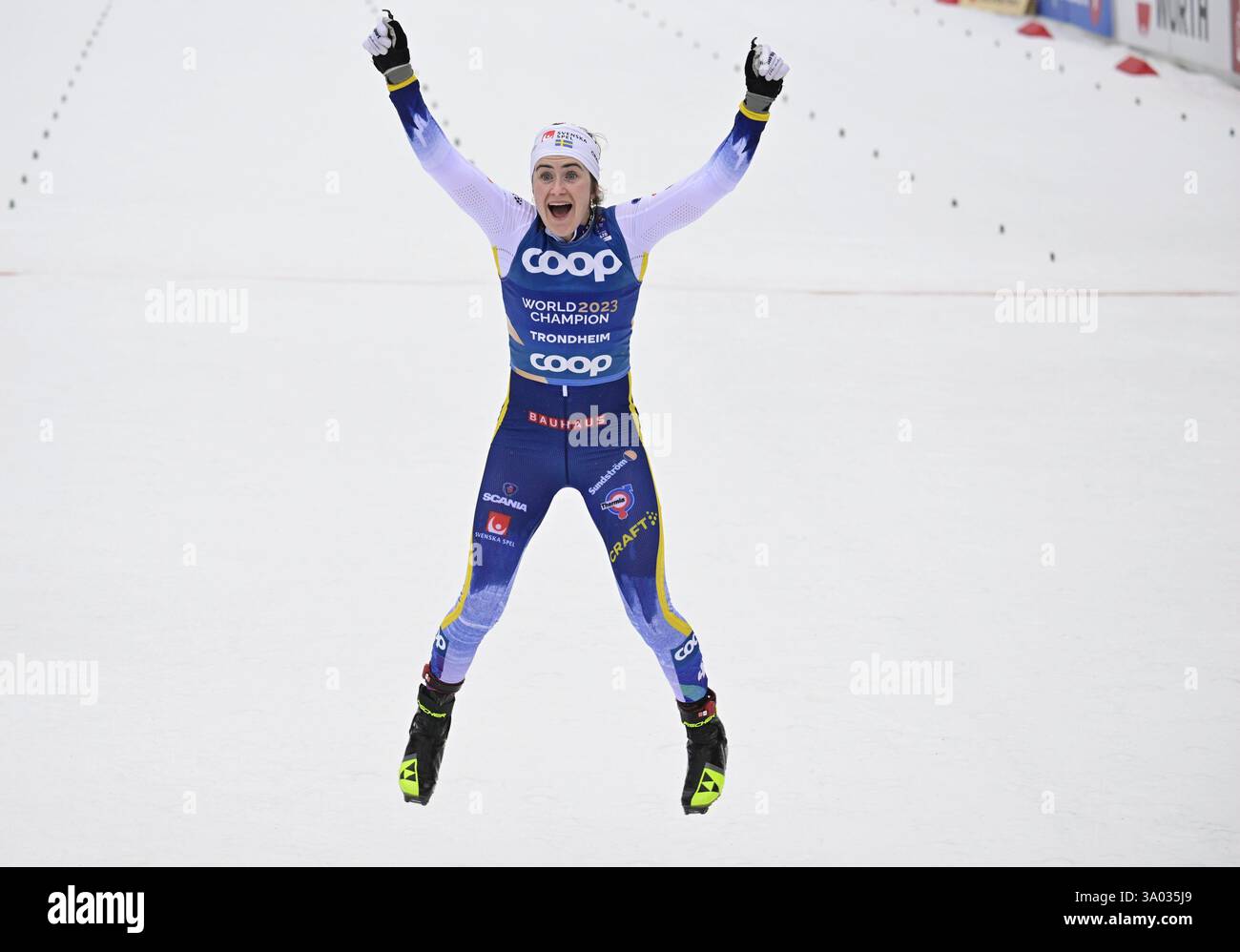 Ebba Andersson of Sweden celebrates winning the women's 10 km Classic ...