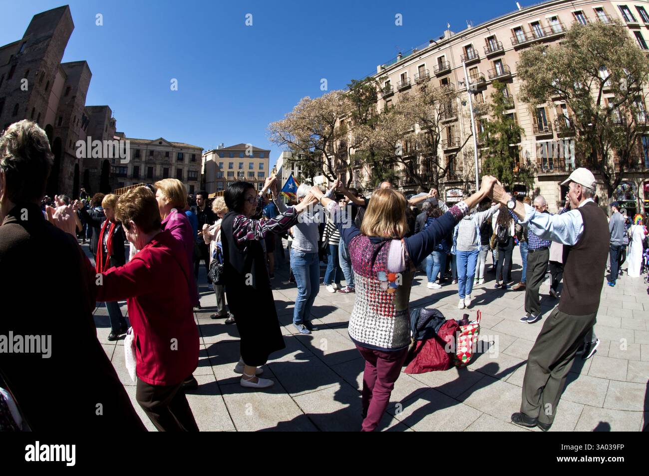 Sardanistas, people dancing the traditional catalan dance, sardana, in ...