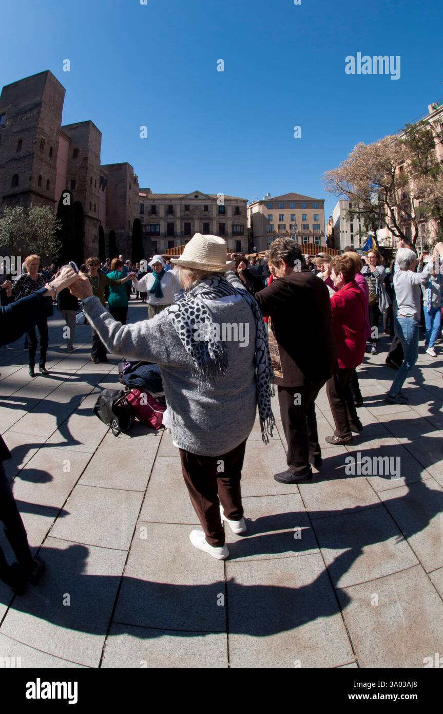 Sardanistas, people dancing the traditional catalan dance, sardana, in ...