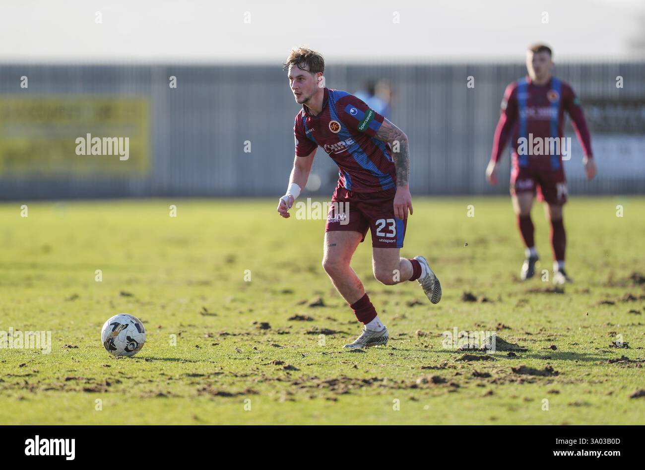 Dumbarton, UK, 1st March 2025 - Sam Fisher attacks fro Stenhousemuir ...