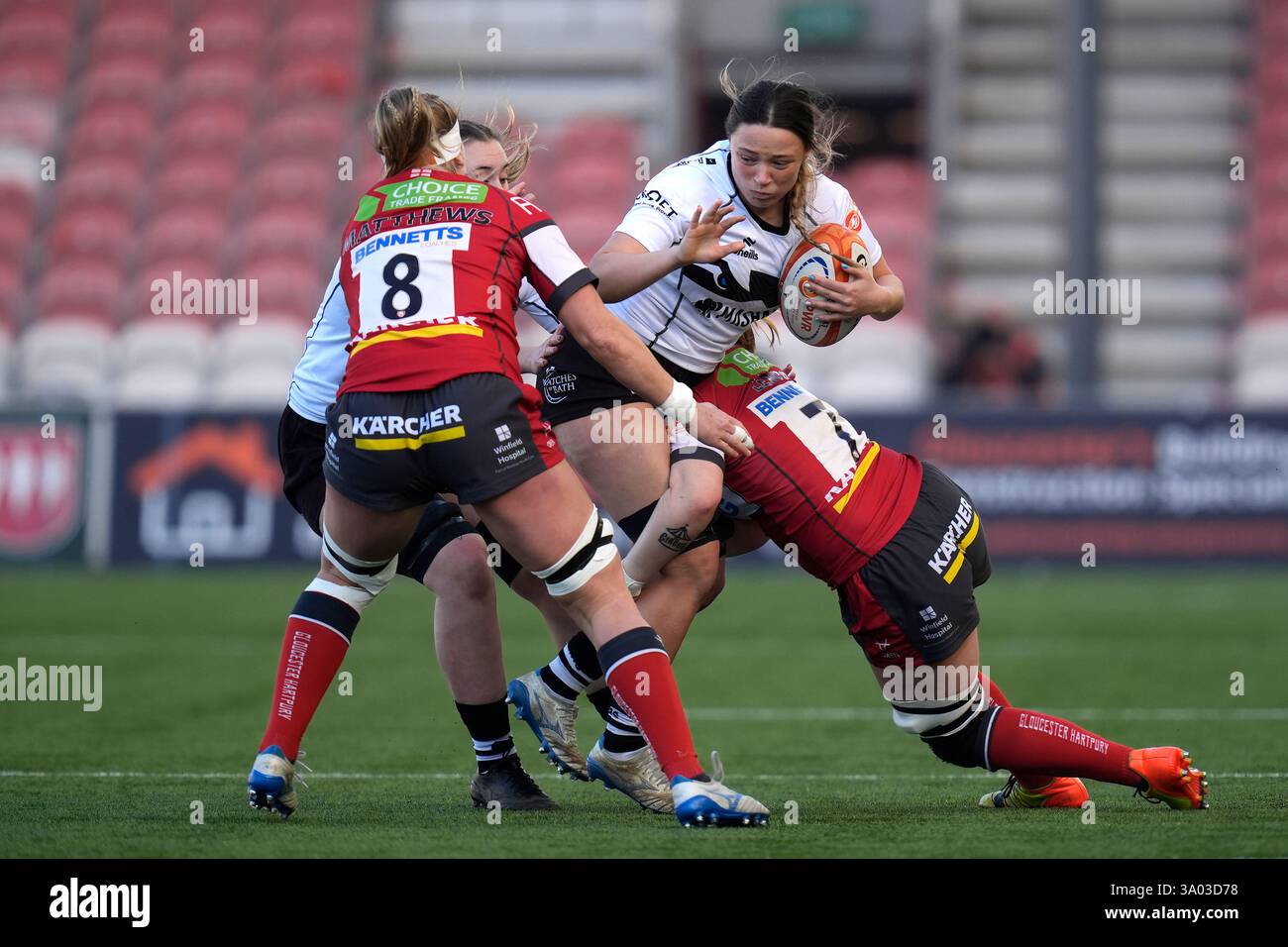 Bristol Bears' Alisha Joyce-Butchers (centre) is tackled by Gloucester ...
