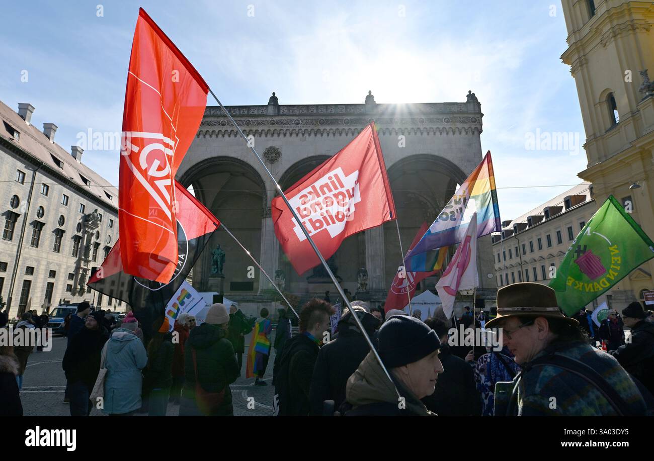 02 March 2025, Bavaria, Munich: Participants in the demonstration ...