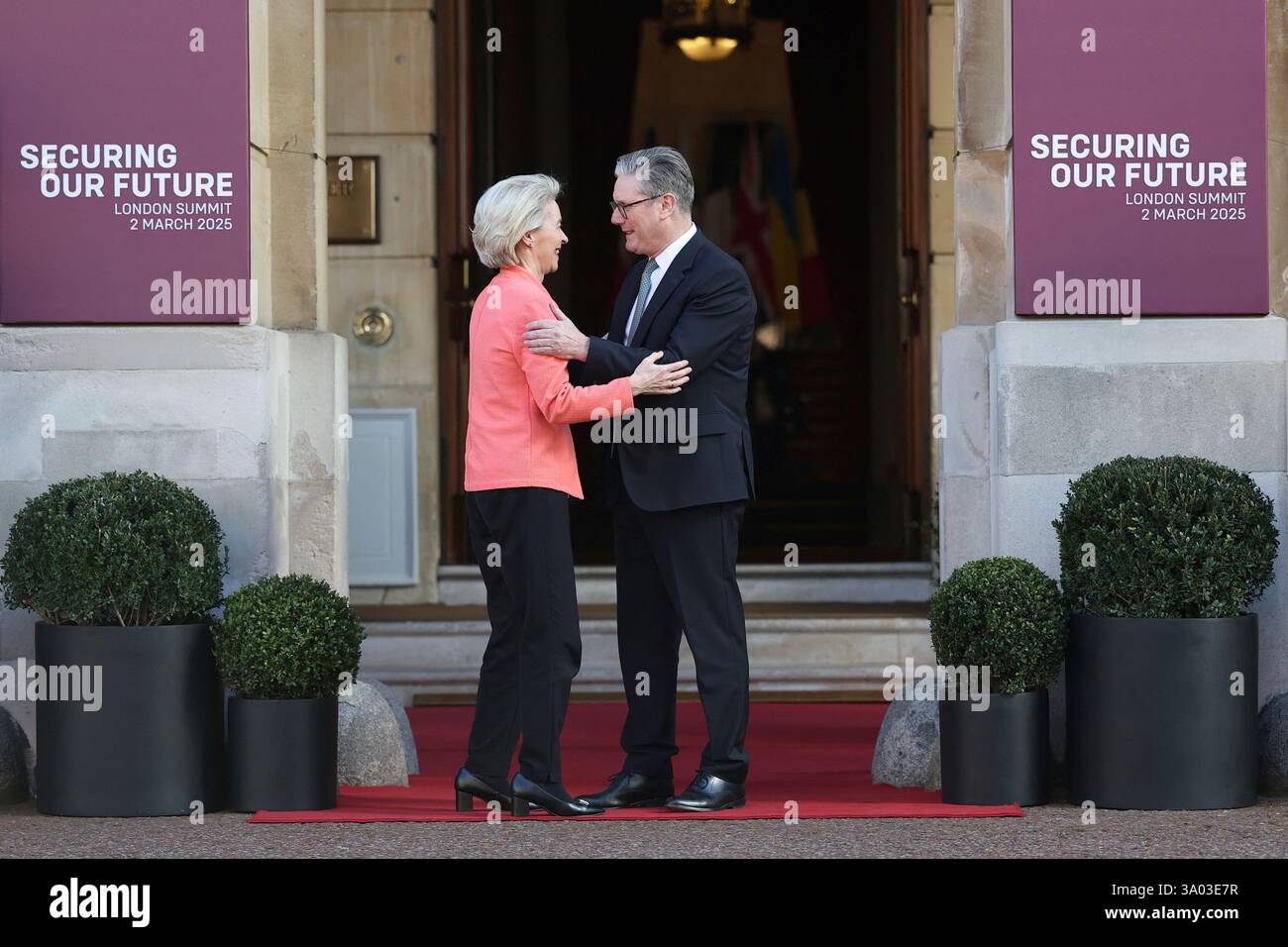 Britain's Prime Minister Keir Starmer, right, welcomes European ...