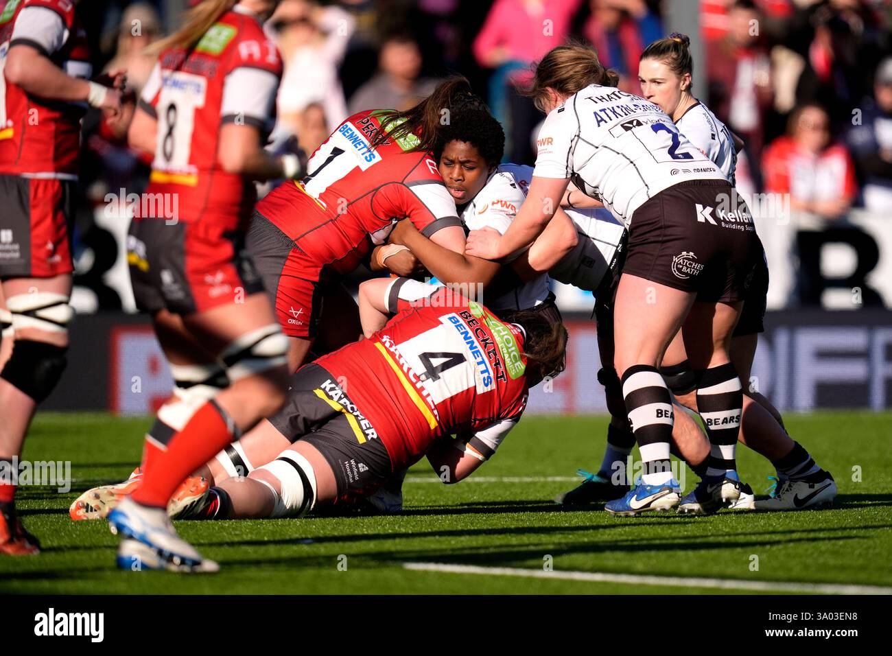 Bristol Bears' Christiana Balogun (centre) is tackled by Gloucester ...