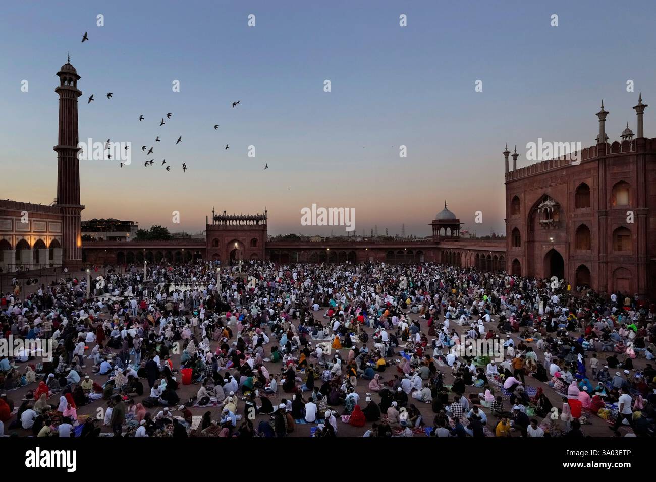 Devout Muslims break their fast at sundown on the first day of Ramadan ...