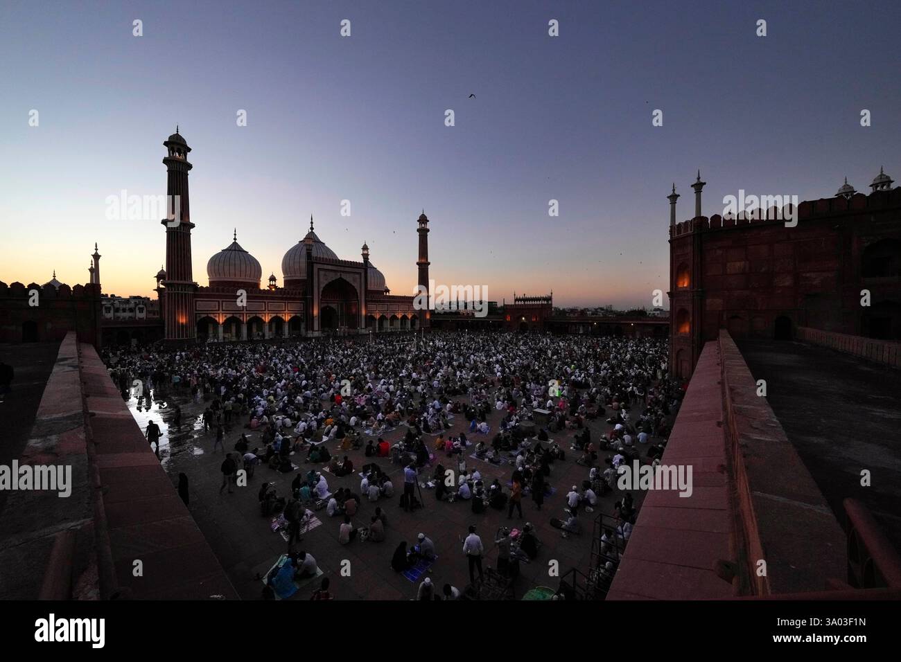 Devout Muslims break their fast at sundown on the first day of Ramadan ...