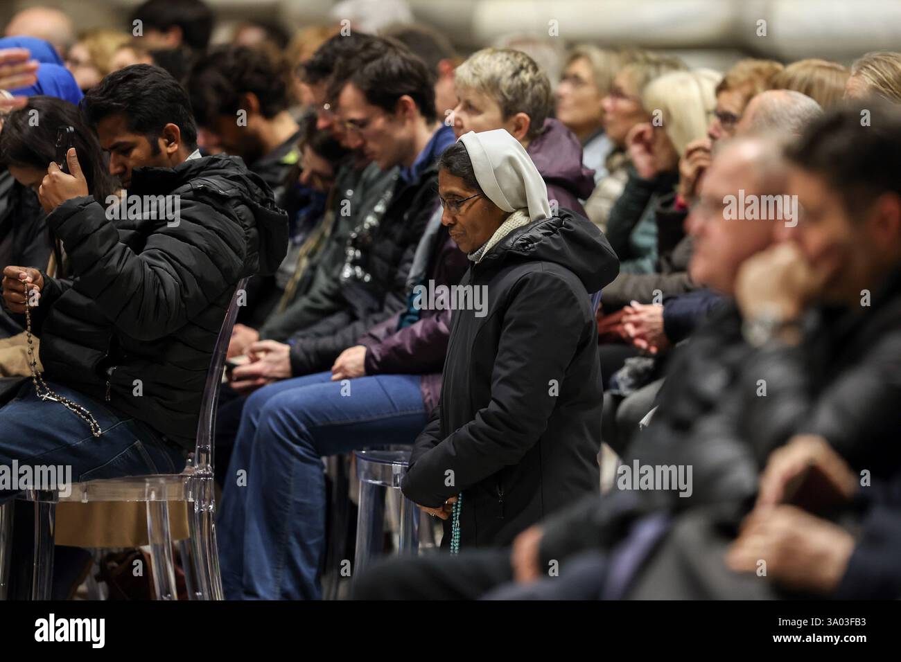 Vatican, Italy. 01st Mar, 2025. A nun recites the Holy Rosary for Pope ...