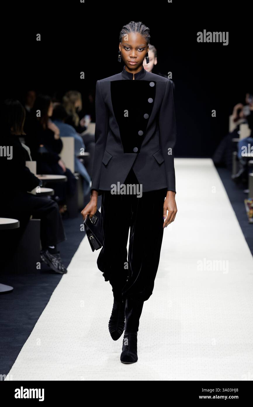 Milan, Italy. 02nd Mar, 2025. A model walks on the runway during the ...