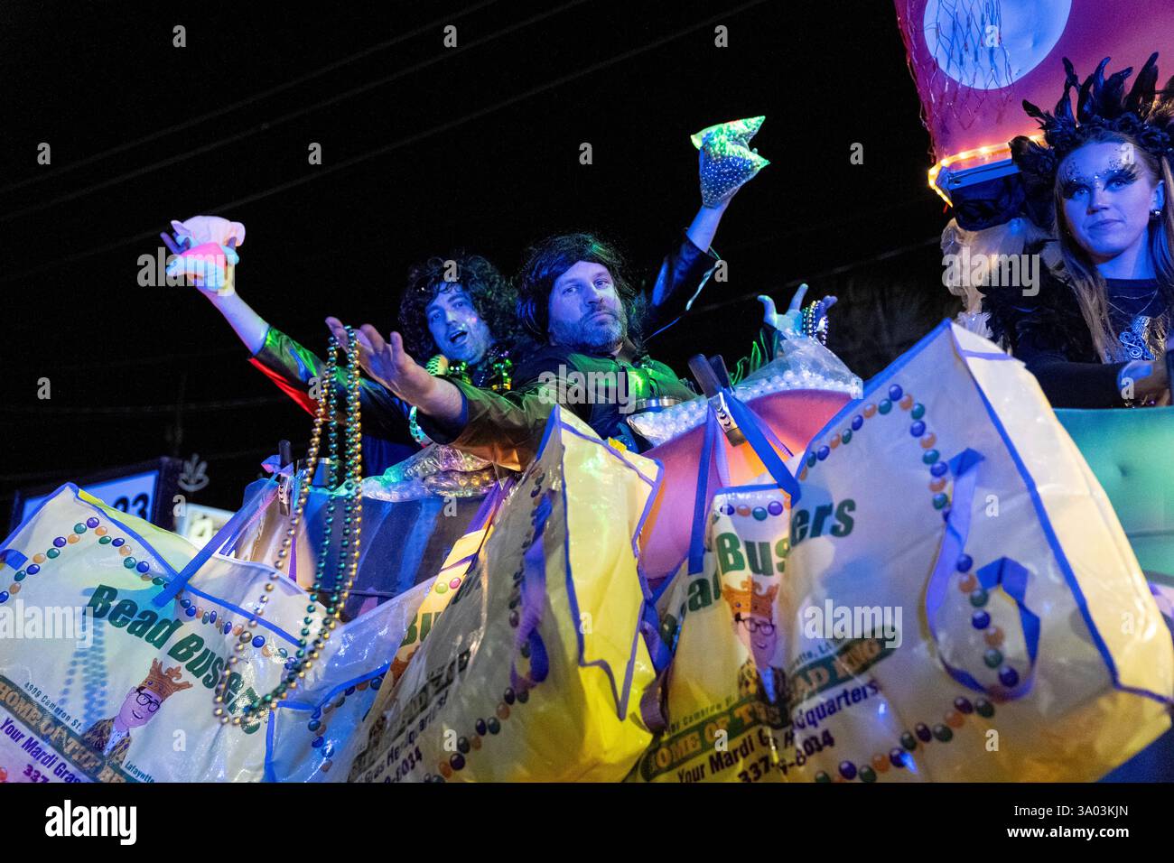 Paradegoers are seen during the Bonaparte Parade Mardi Gras Parade on ...