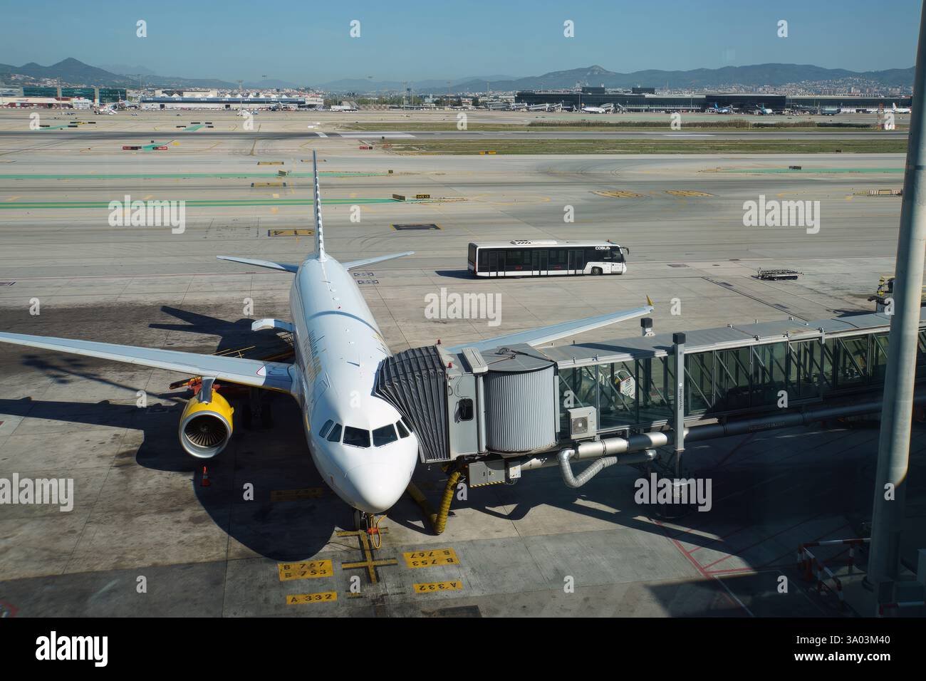 Preflight closeup of white jet cockpit and windows with pilot inside ...