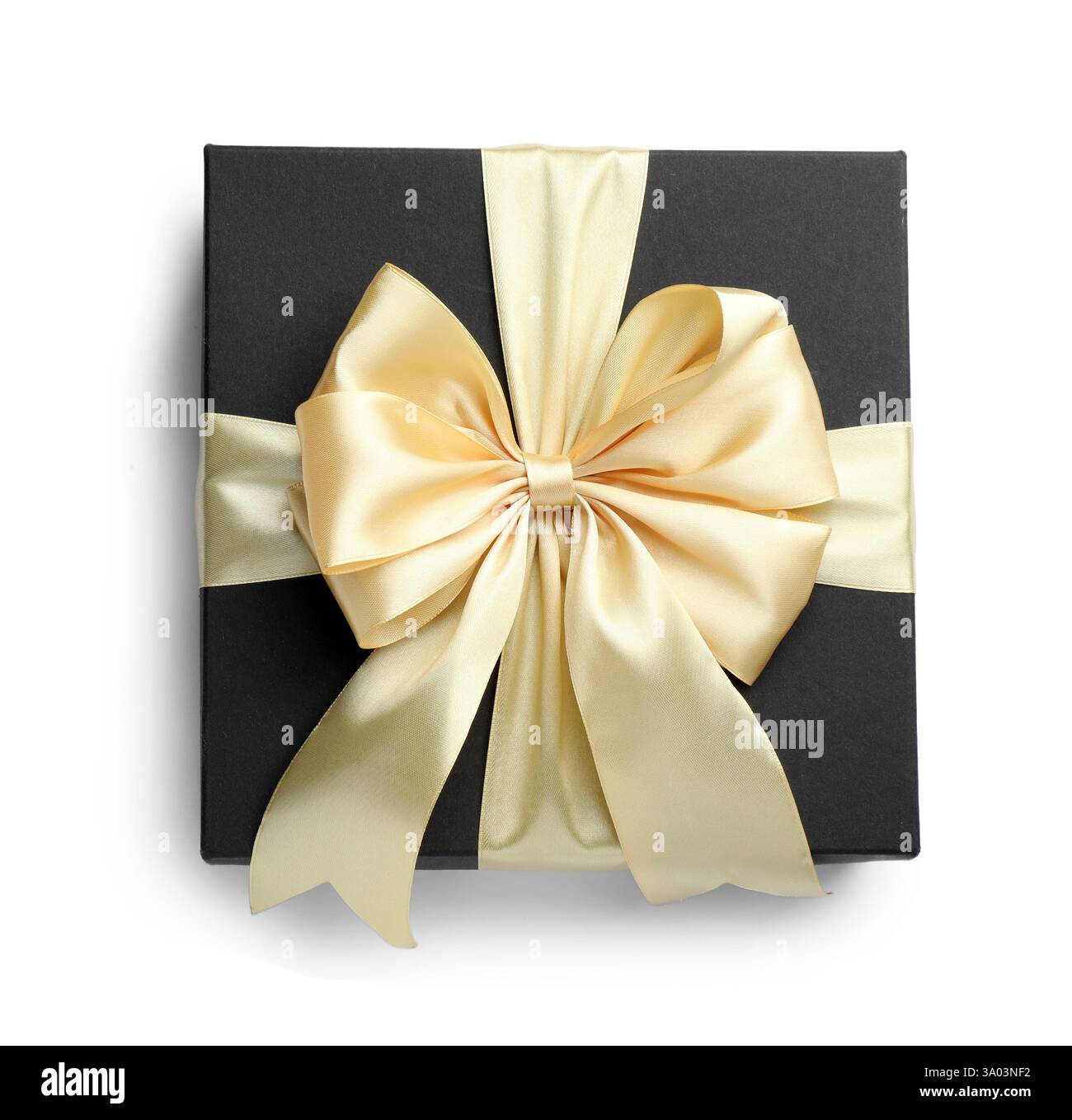 Gift box with golden bow isolated on white, top view Stock Photo - Alamy