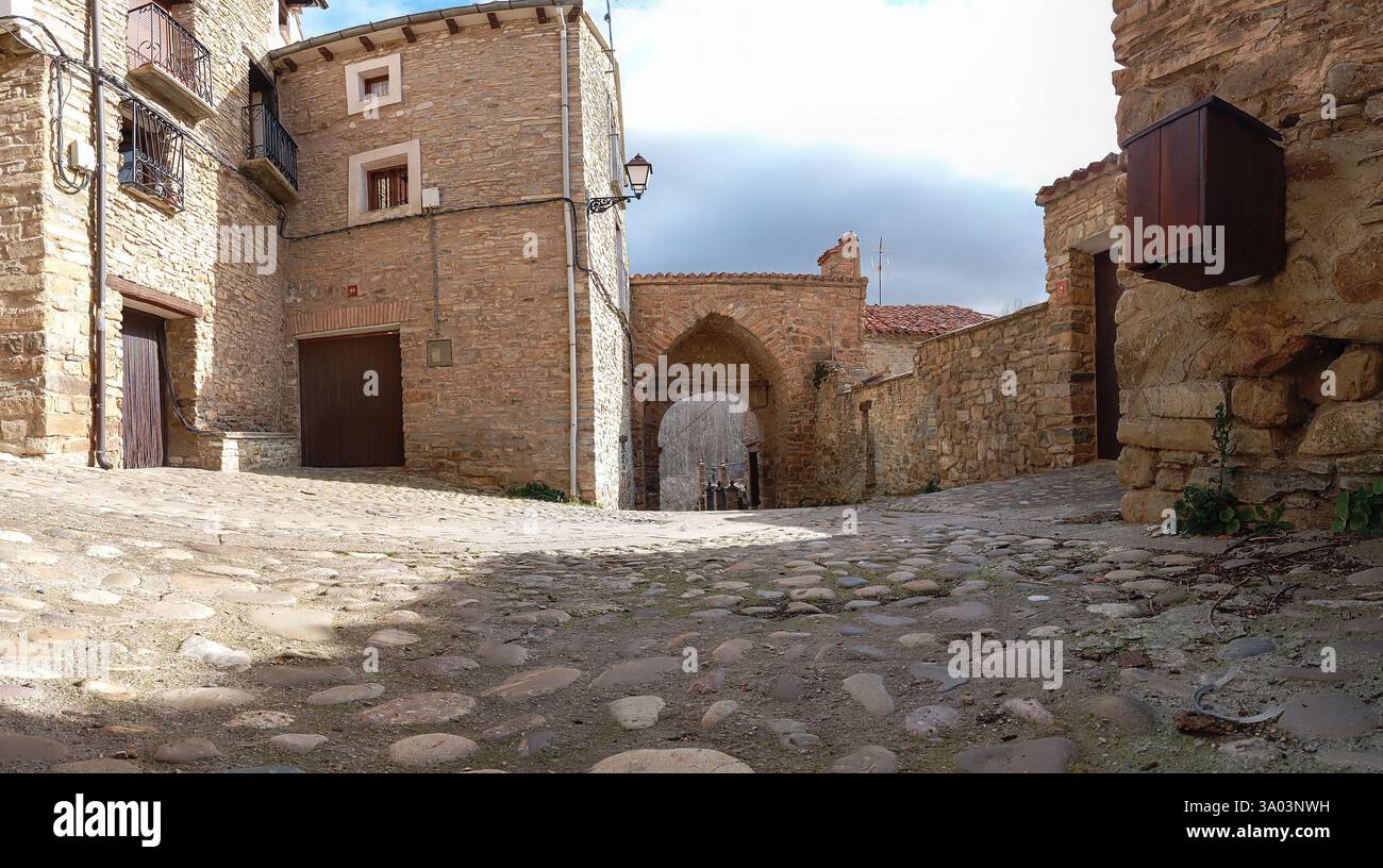 Ancient stone gate known as the River Gate in Yanguas, Soria, with ...