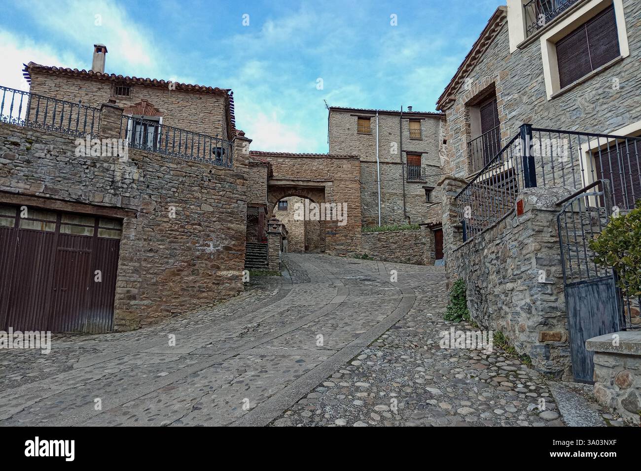 Ancient stone gate known as the River Gate in Yanguas, Soria, with ...