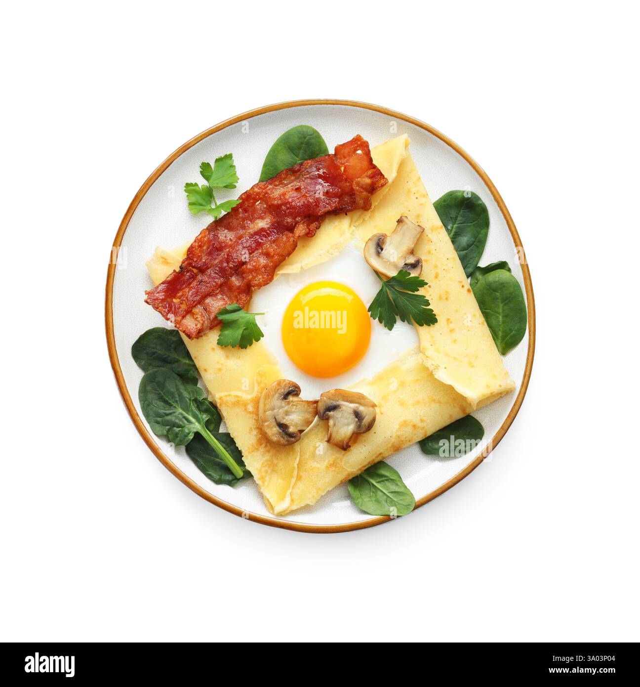 Delicious crepe with egg, bacon and mushrooms isolated on white, top ...
