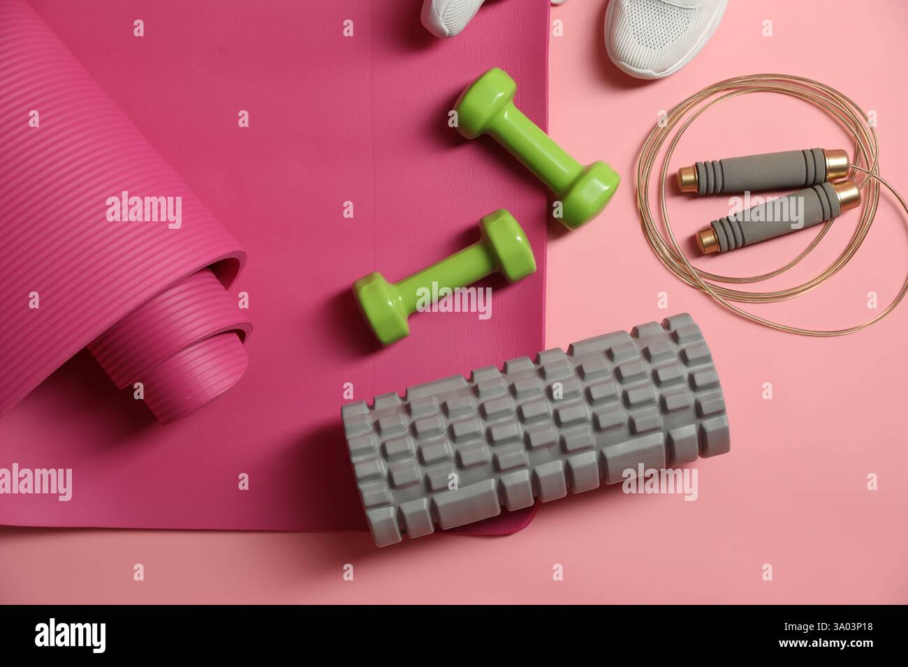 Different gym stuff on pink background, flat lay Stock Photo - Alamy