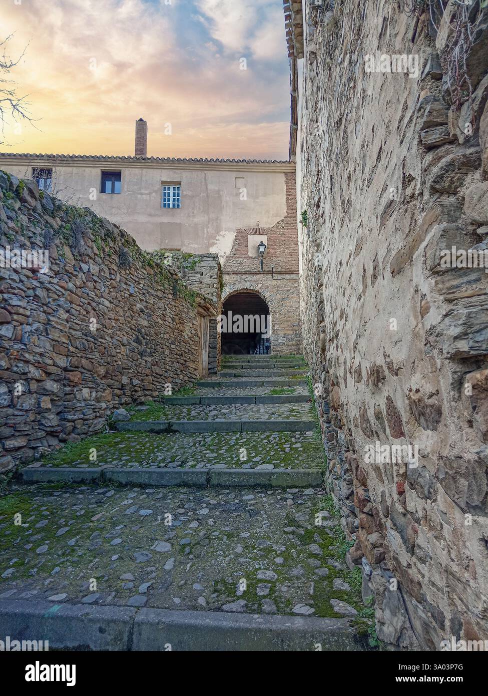 Old stone passage with an arched entrance in Yanguas, Soria, featuring ...