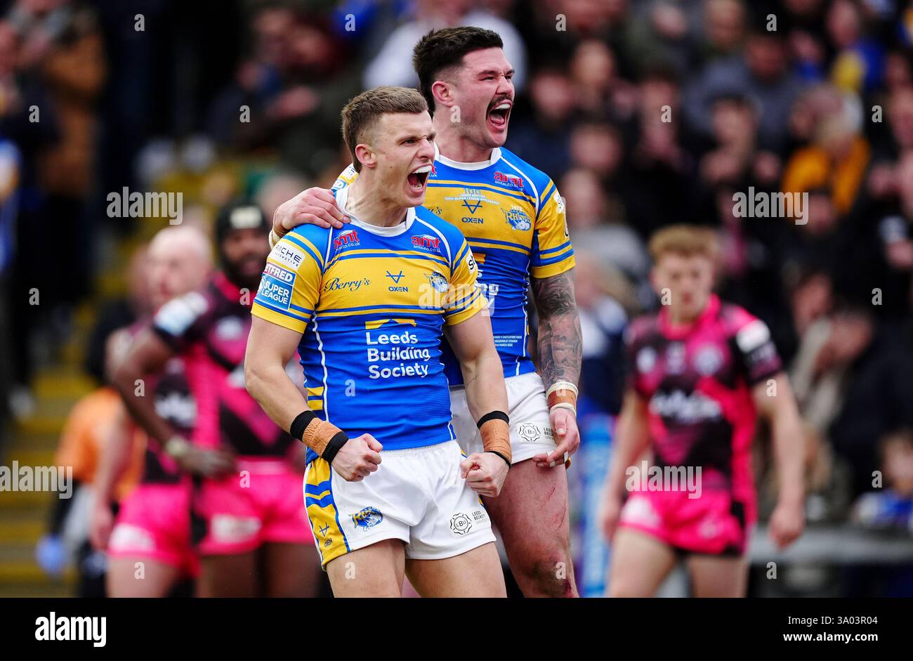 Leeds Rhinos' Ash Handley (left) celebrates scoring a try during the ...