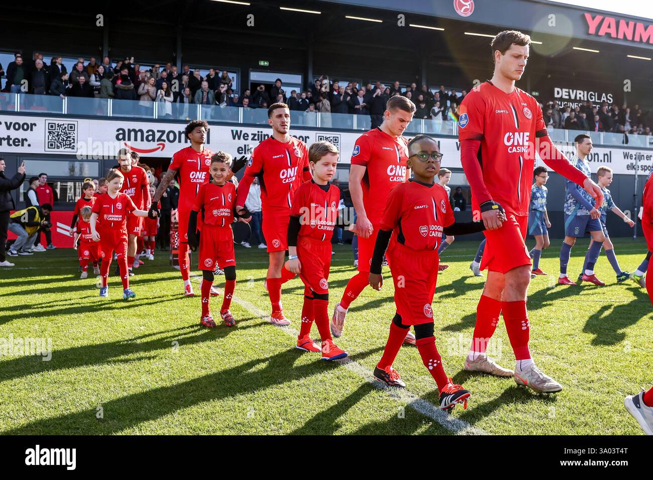 ALMERE, NETHERLANDS - MARCH 2: Almere City FC players enter the field ...