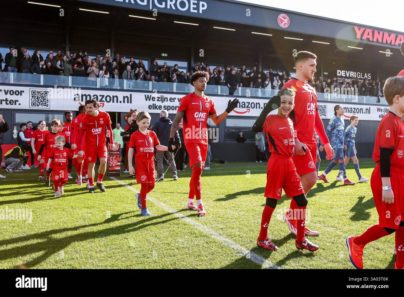 ALMERE, NETHERLANDS - MARCH 2: Almere City FC players enter the field ...