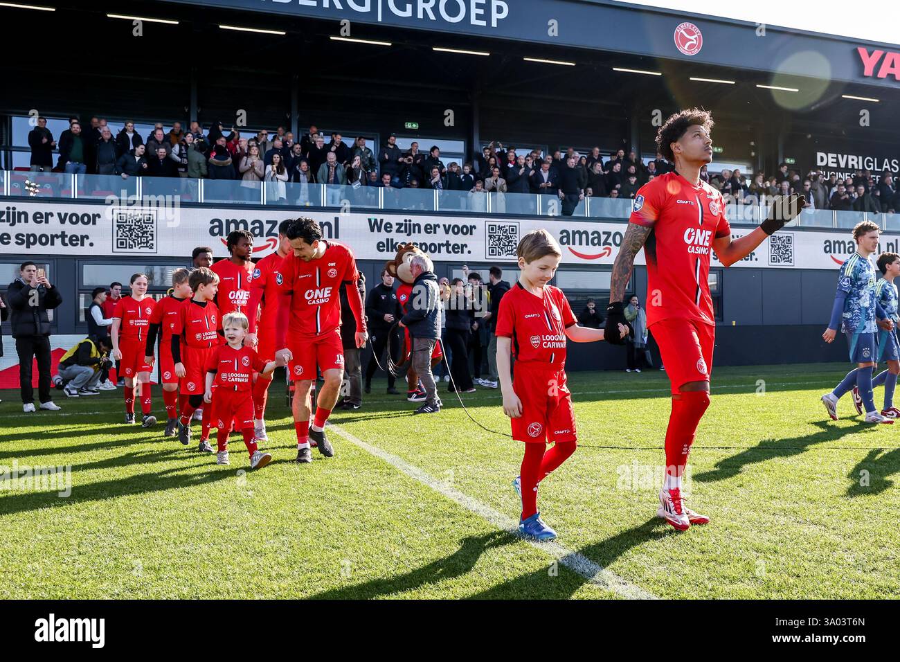 ALMERE, NETHERLANDS - MARCH 2: Almere City FC players enter the field ...