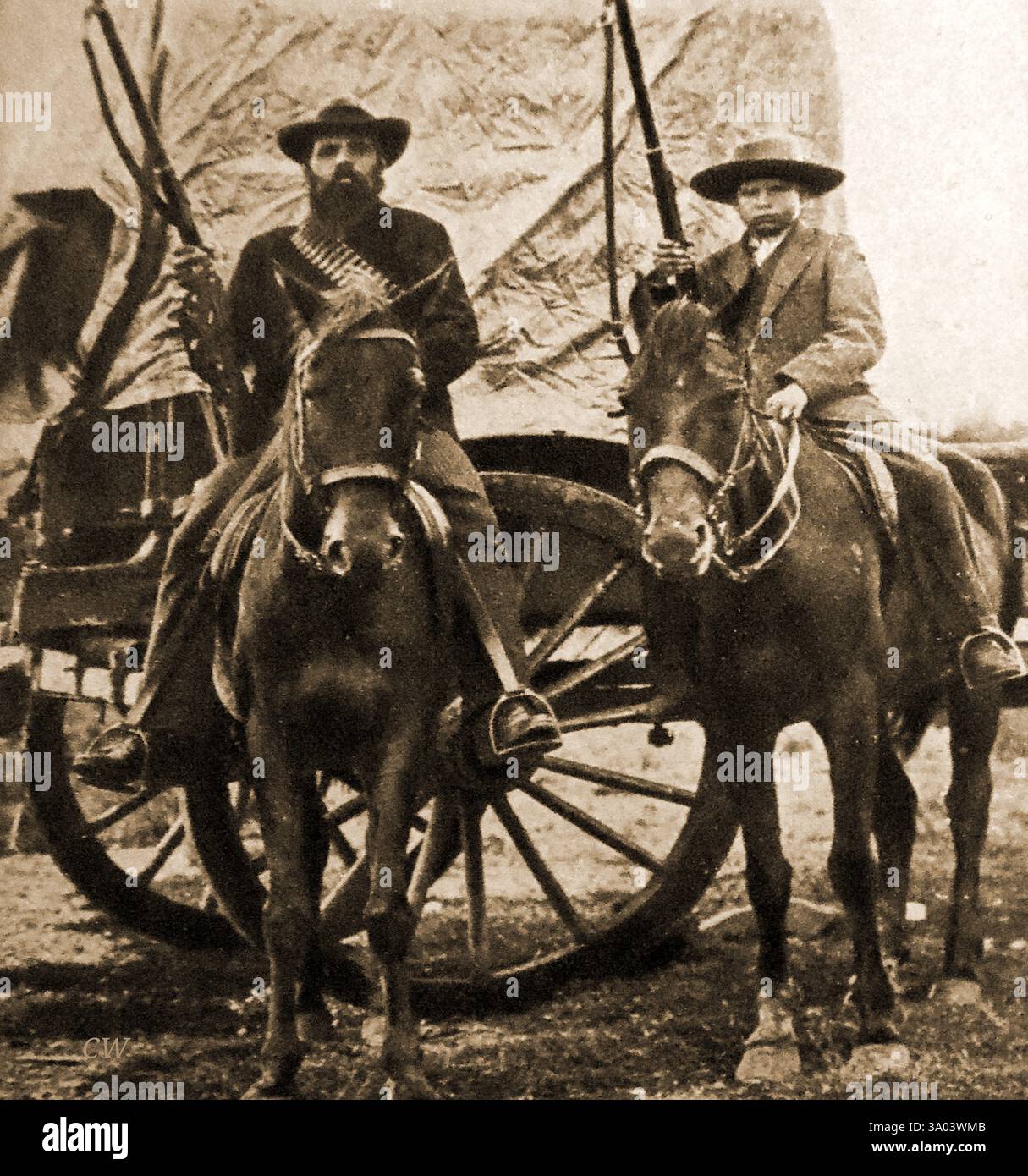 Boer War 1910 - Typical Boers, A Father and son on horseback Stock Photo - Alamy