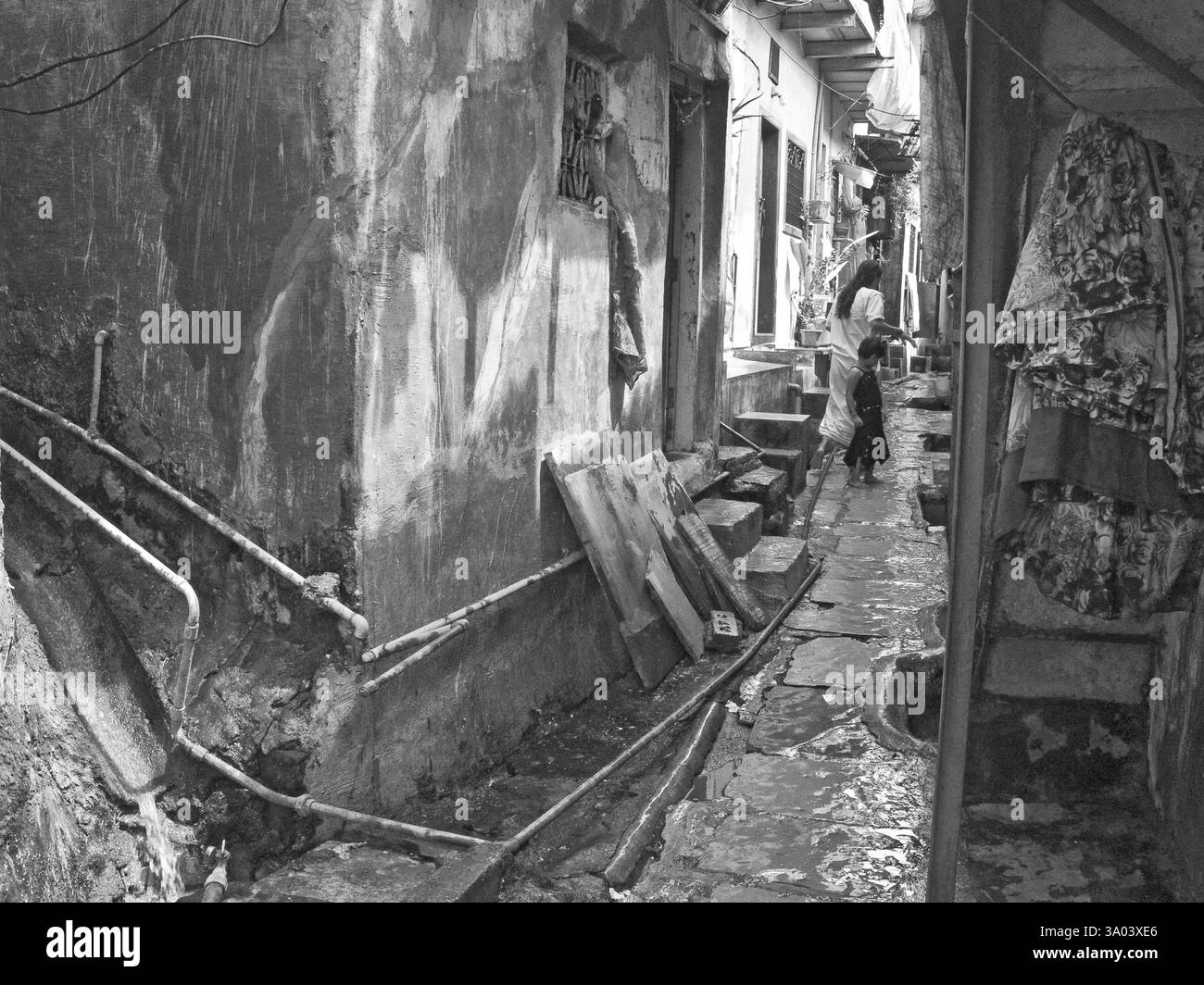 Narrow lane in Bhatwadi and Devnar slum, Bombay Mumbai, Maharashtra ...