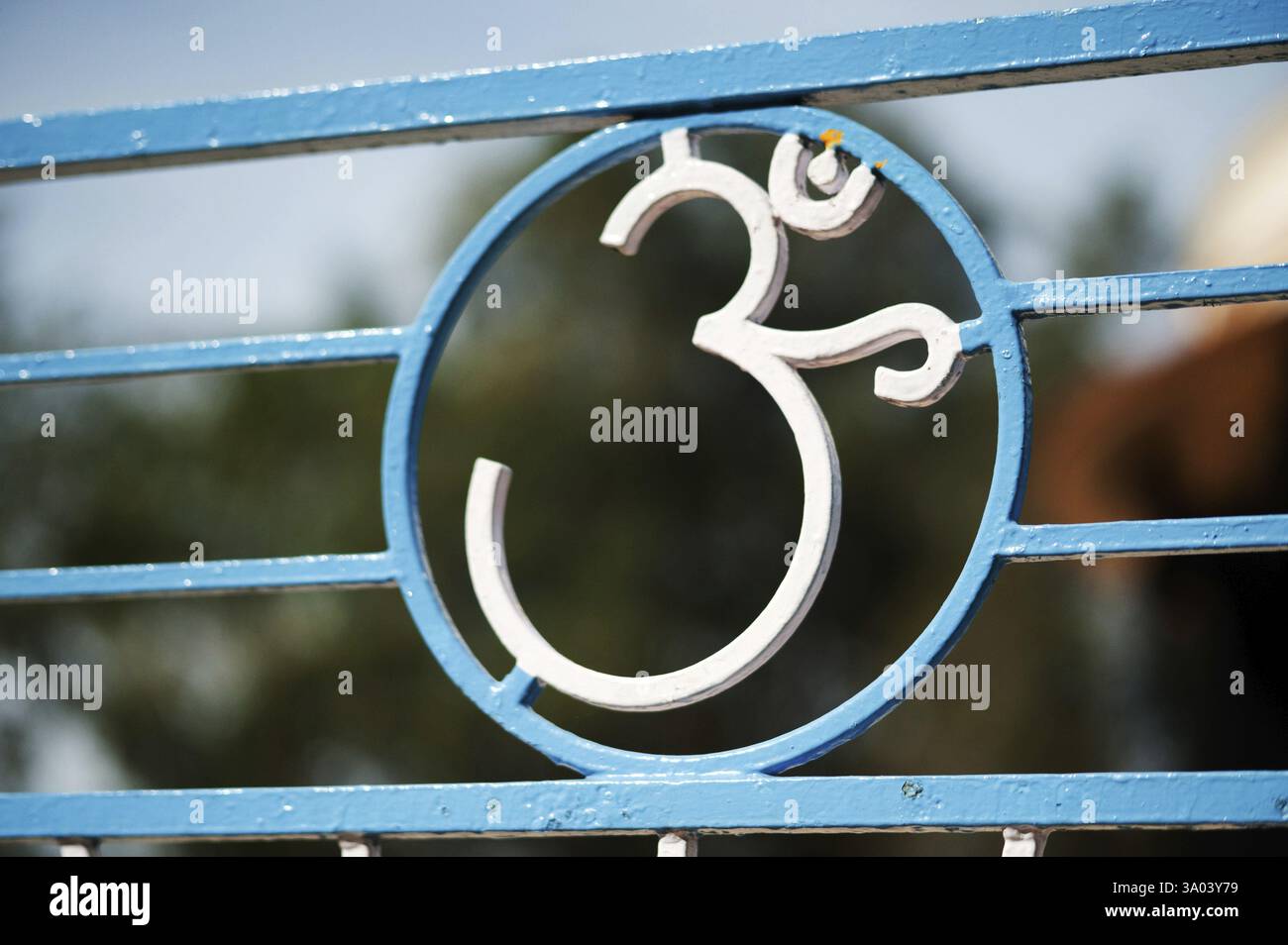 Om symbol in metal Stock Photo - Alamy