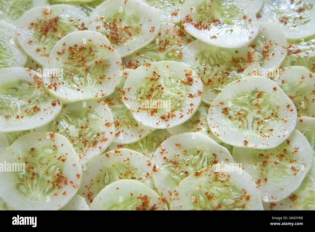 Cucumber slices with masala 14-May-2010 Stock Photo - Alamy