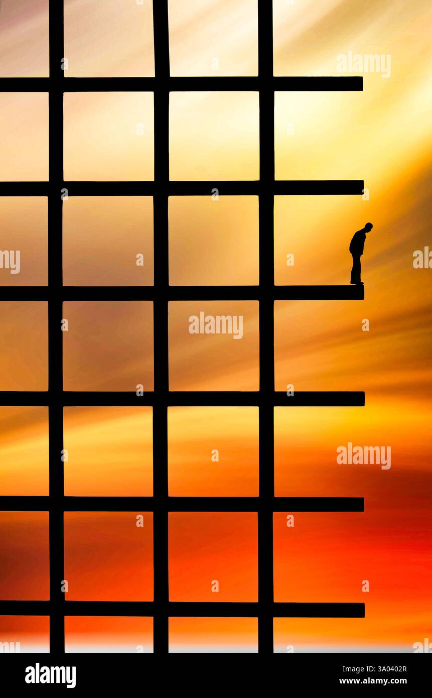 Person standing on a grid against a vivid sunset backdrop with dramatic ...