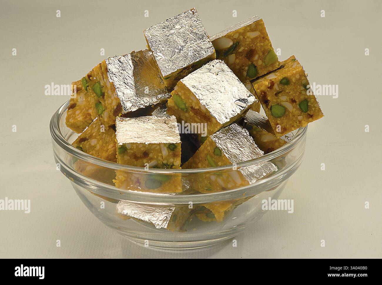 Sweet, panchmeva chakki in bowl on white background, Jodhpur, Rajasthan ...