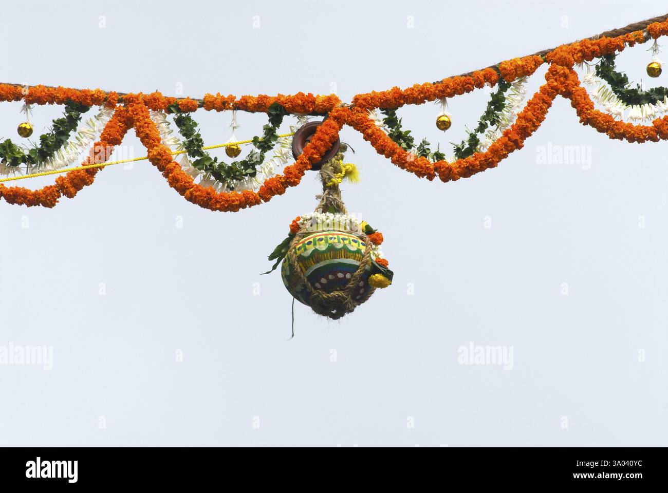 Dahi handi decorated by flowers hanging on janmashtami gokulashtami ...