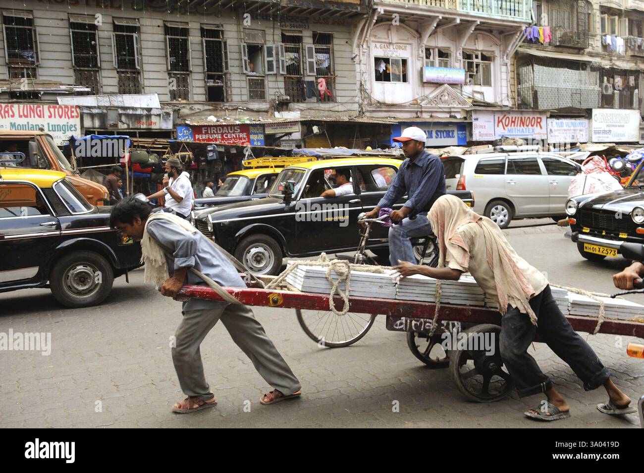 Human pulling car hi-res stock photography and images - Alamy